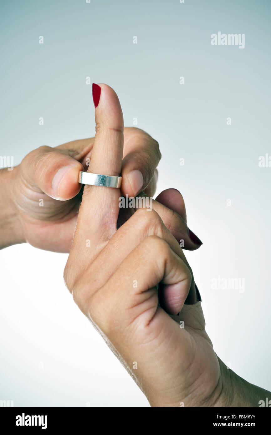 Woman removing ring wedding hi-res stock photography and images - Alamy