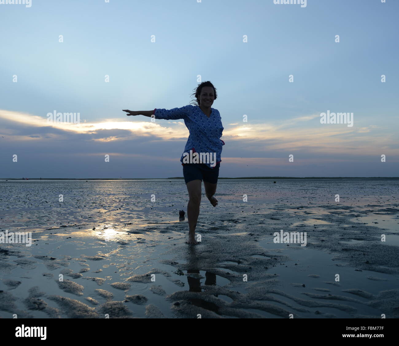 Balance on beach woman hi-res stock photography and images - Alamy