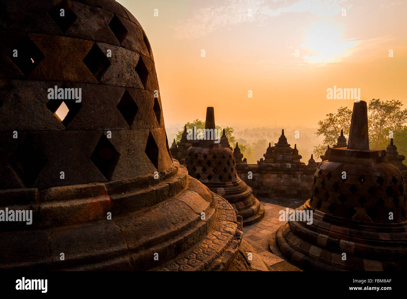 The beautiful stupas of Borobudur Temple complex, Yogyakarta, Indonesia ...