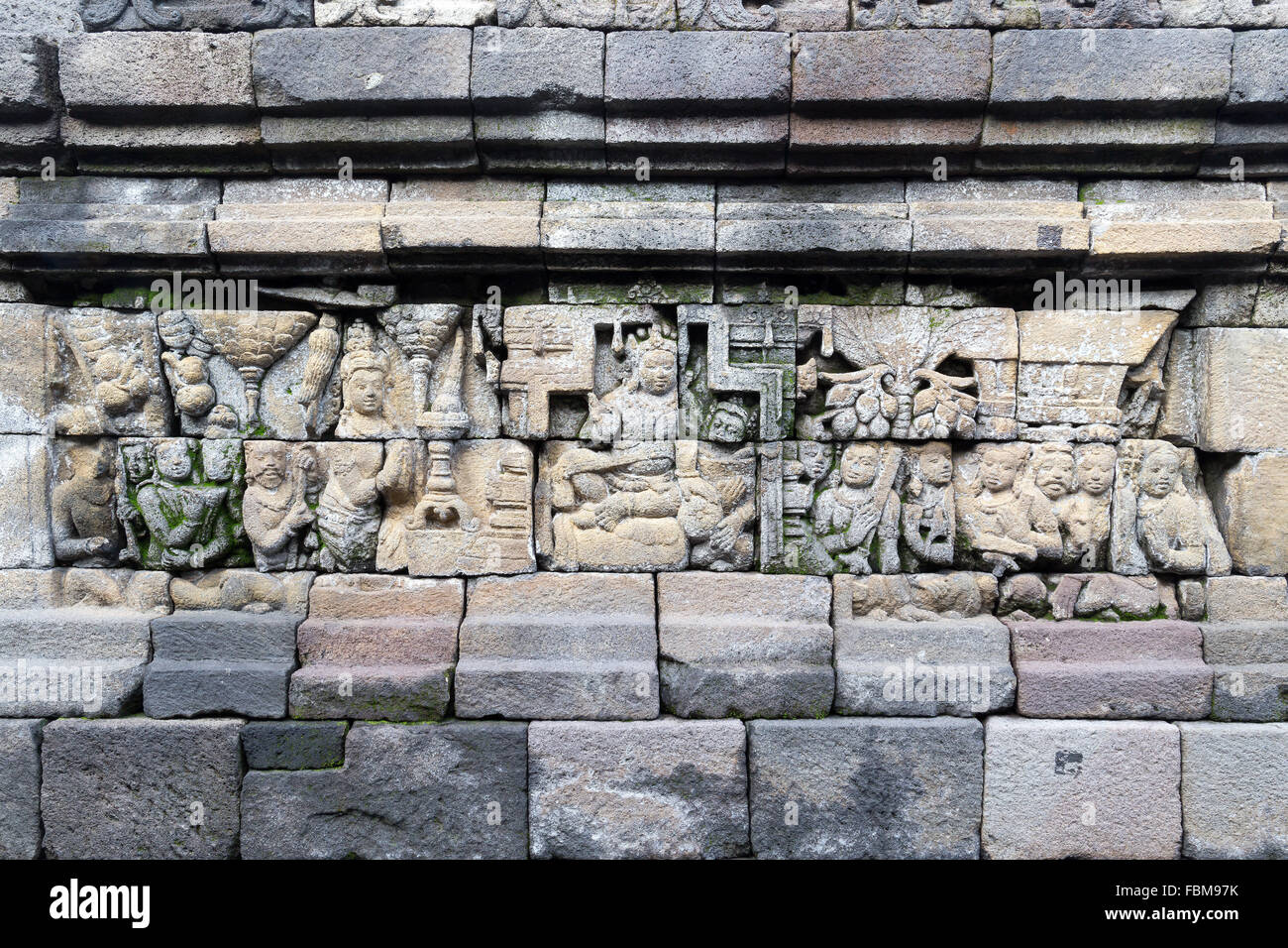 Relief panel of Borobudur temple in Indonesia. Borobudur is the largest ...