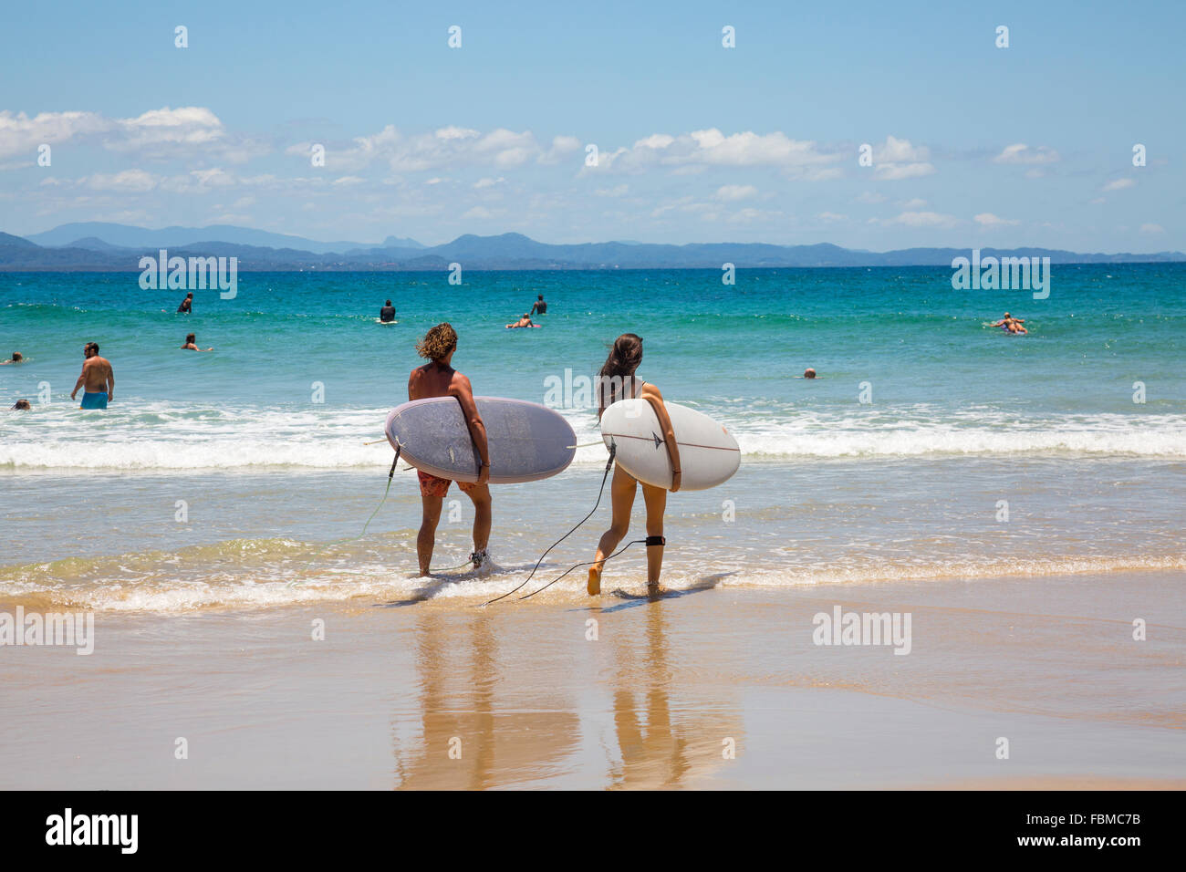 Boy and girl surfers hi-res stock photography and images - Alamy