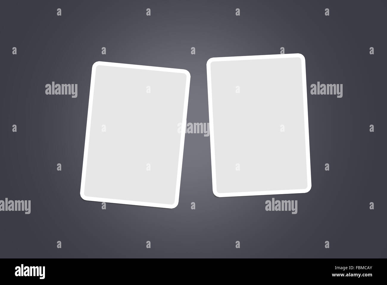 Close up front view of blank grey illustrative cards with copy space ...