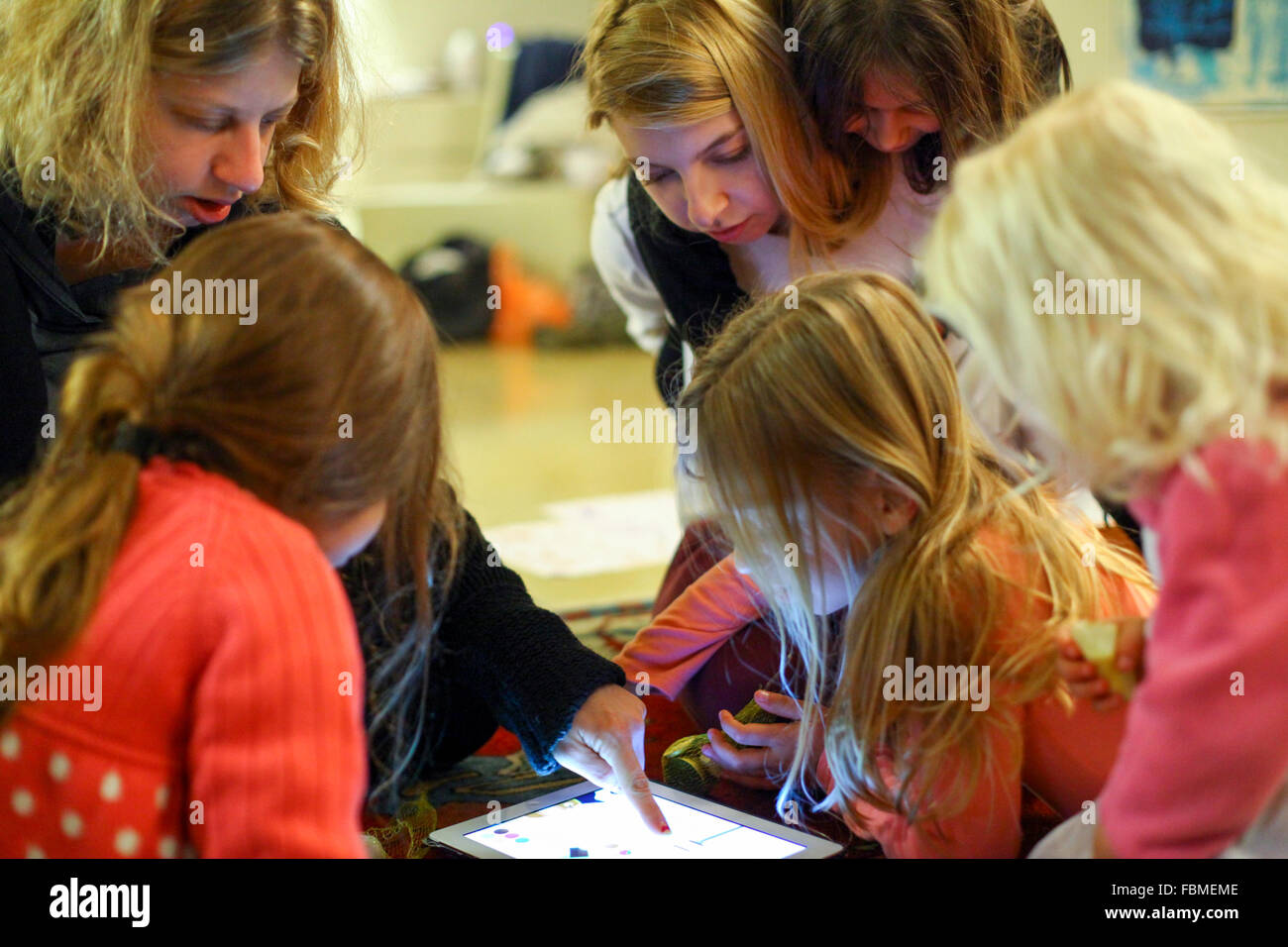 Family ipad hi-res stock photography and images - Alamy