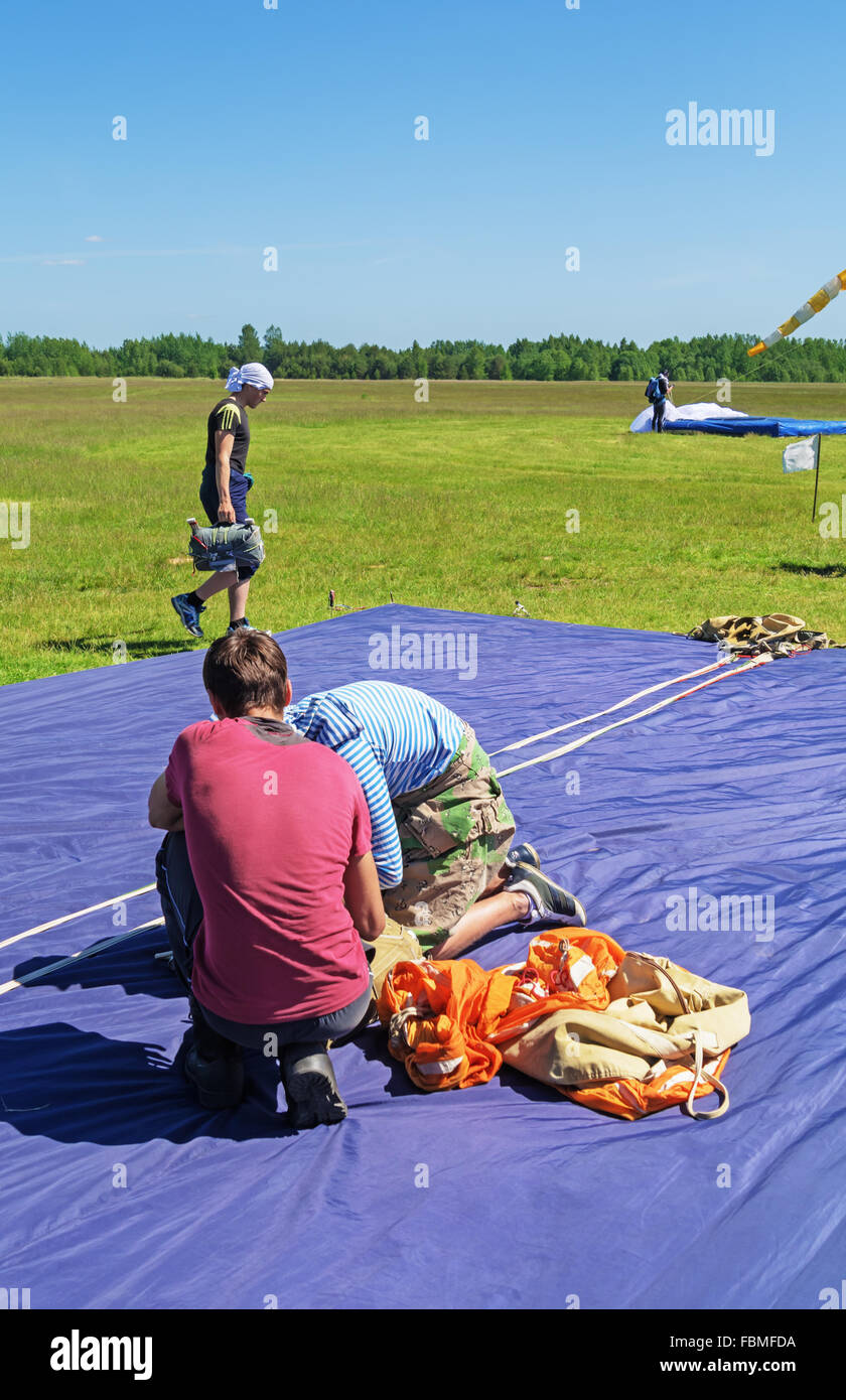 Parachutists - 2015.Packing of parachute Stock Photo - Alamy