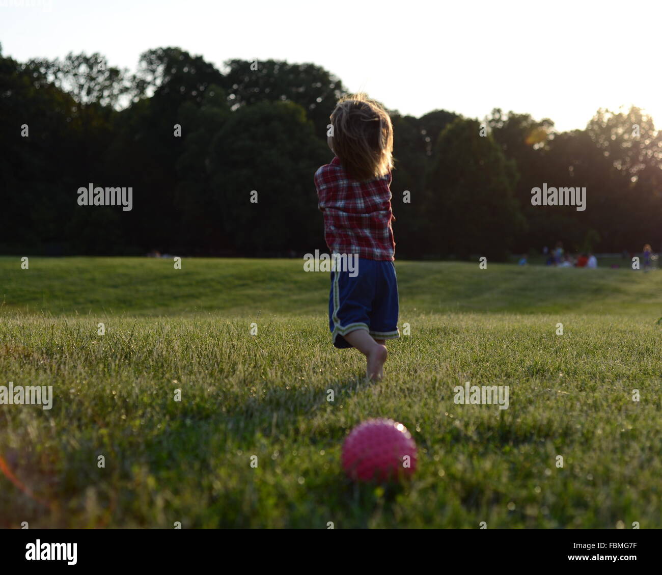 Playing in park child hi-res stock photography and images - Alamy