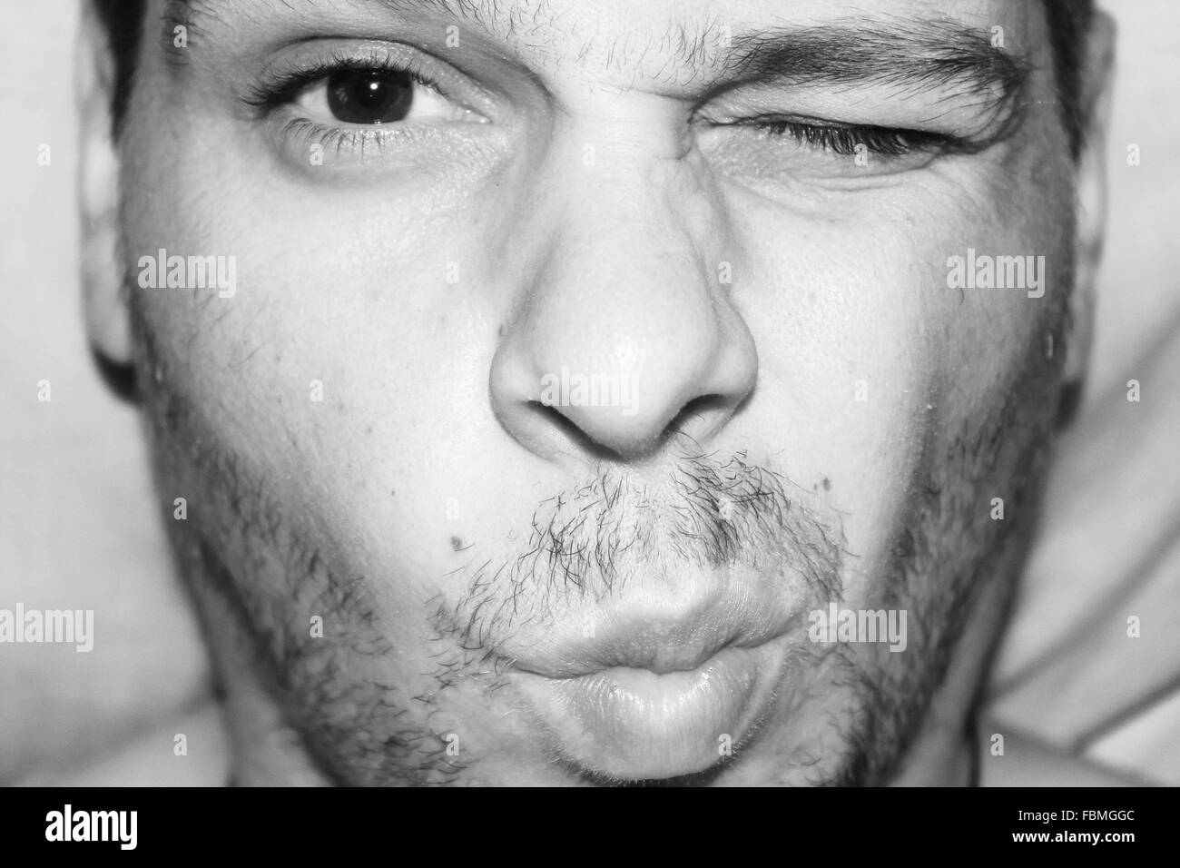 Person winking Black and White Stock Photos & Images - Alamy