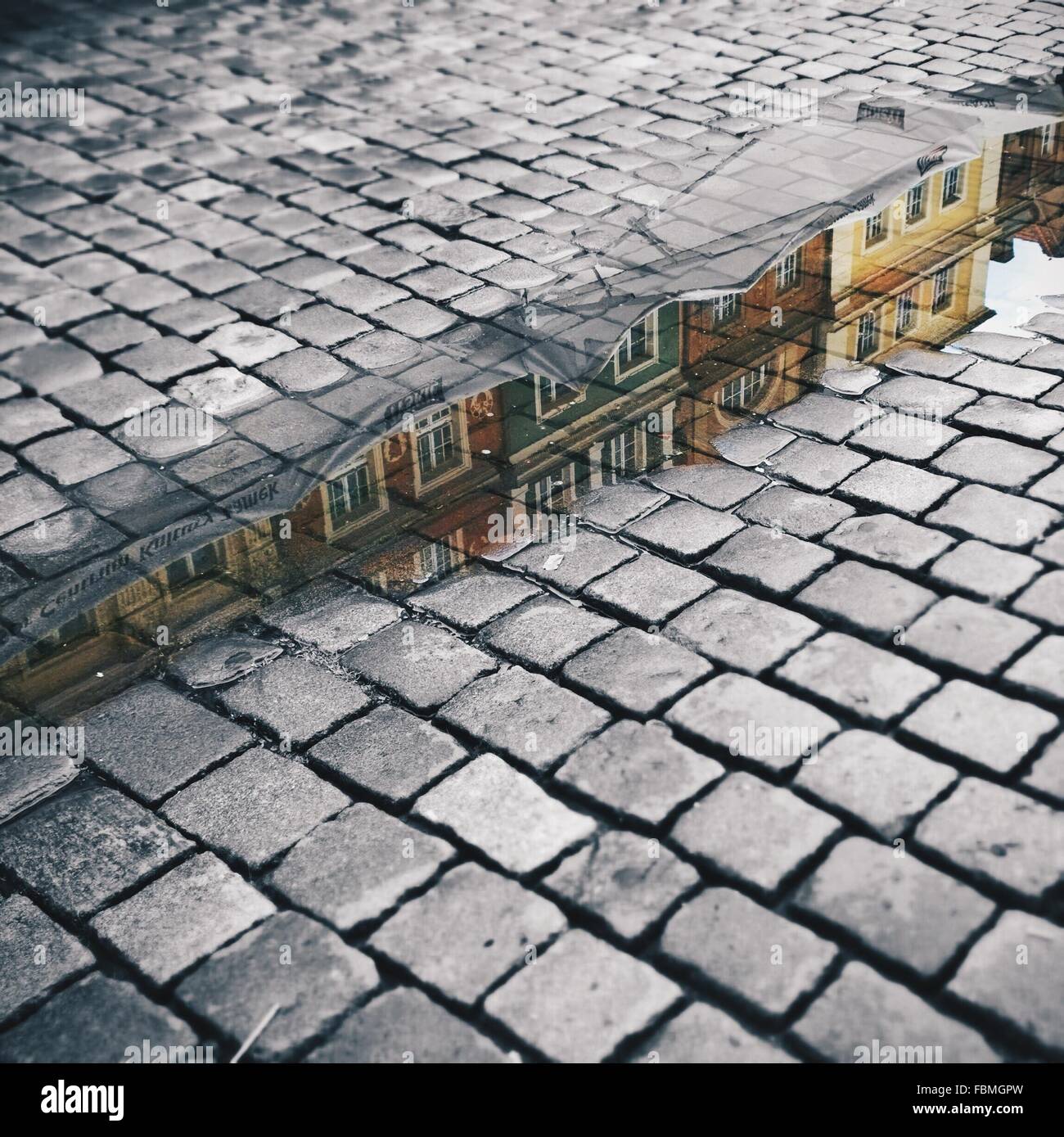 Reflection of buildings in puddle hi-res stock photography and images ...
