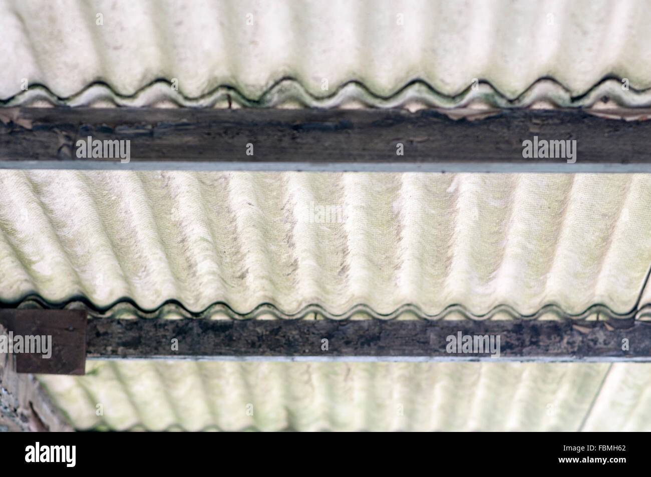 Asbestos car shed roof Stock Photo - Alamy