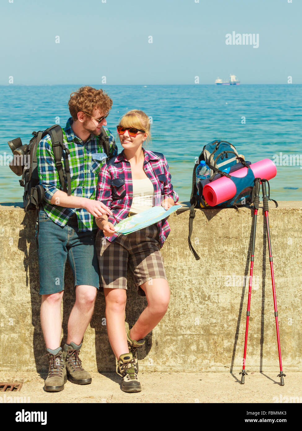 Adventure, summer, tourism active lifestyle. Young couple backpacker ...