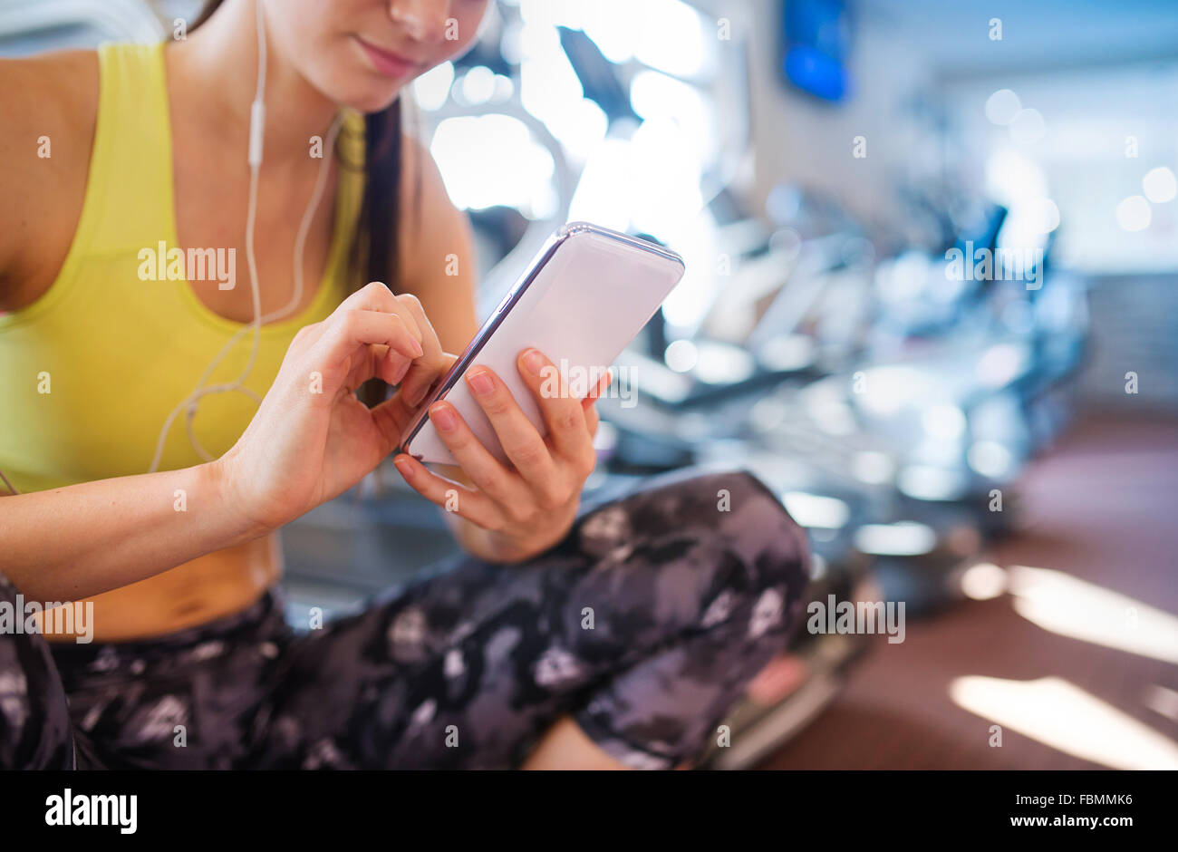 Beautiful woman in gym Stock Photo - Alamy