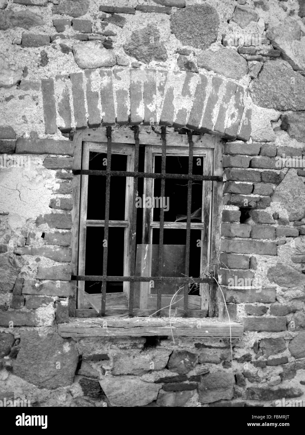 Broken Window Of Abandoned Stone House Stock Photo - Alamy