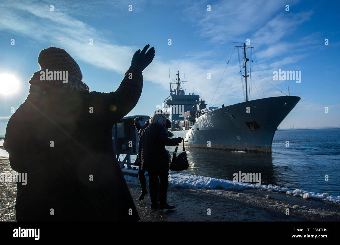 Rostock, Germany. 18th Jan, 2016. Family members wave as the support ...