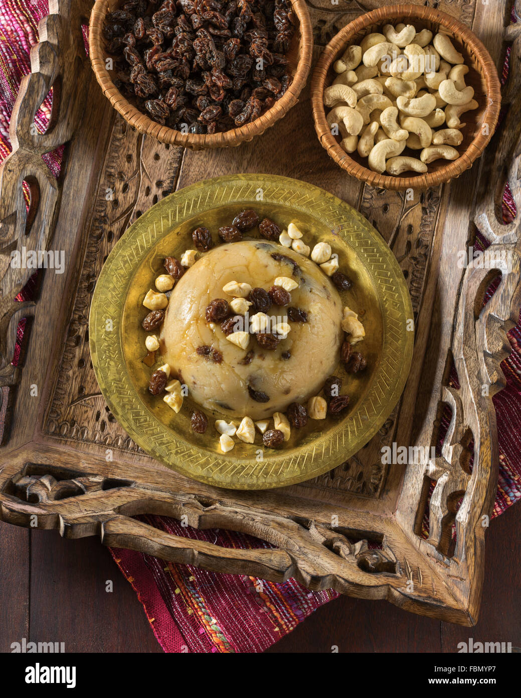Sheera. Semolina dessert with cashew nuts and raisins. India Food Stock ...