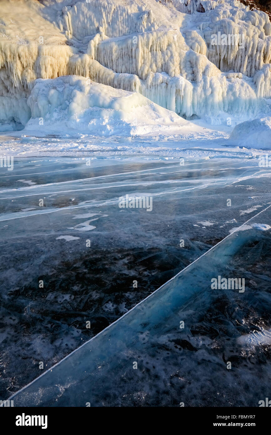 Rocks frozen into the ice of siberian Baikal Lake in winter Stock Photo ...