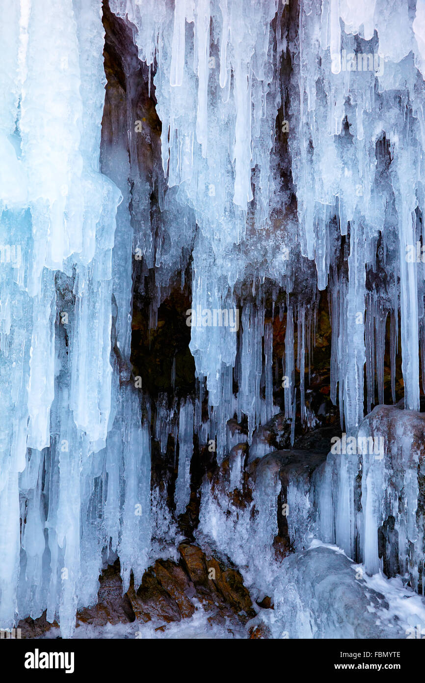 Icicles background on the ice wall on Baikal lake at winter Stock Photo ...