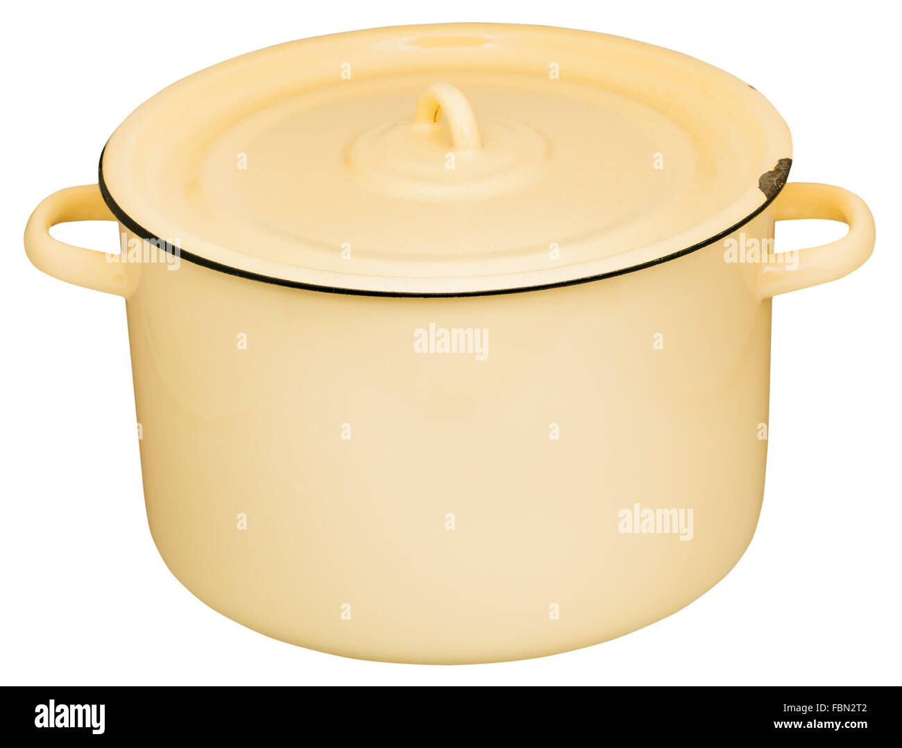 large yellow enamel stockpot closed by lid isolated on white background ...
