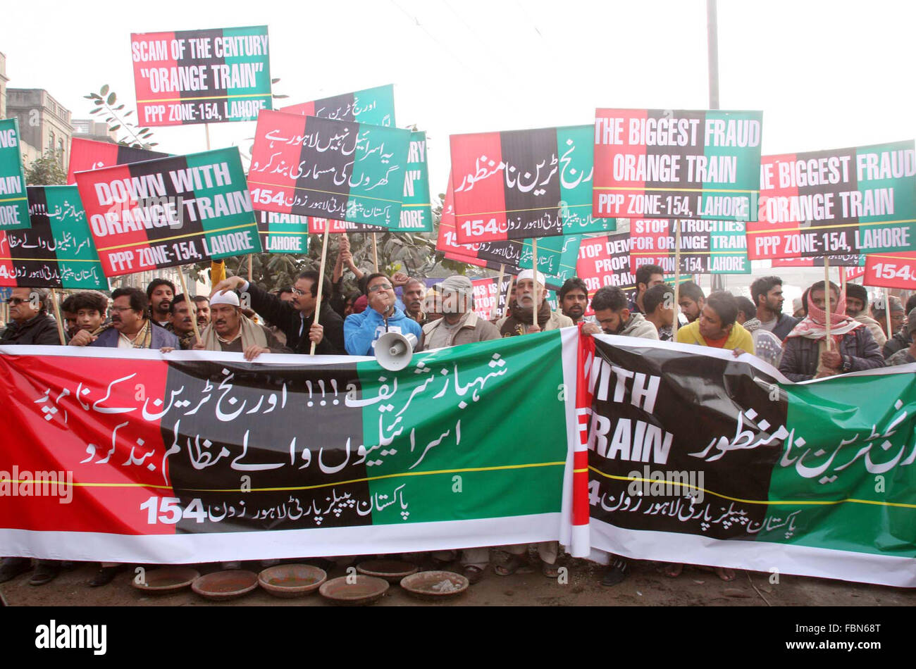 Activists of Peoples Party (PPP) chant slogans against Orange Line ...