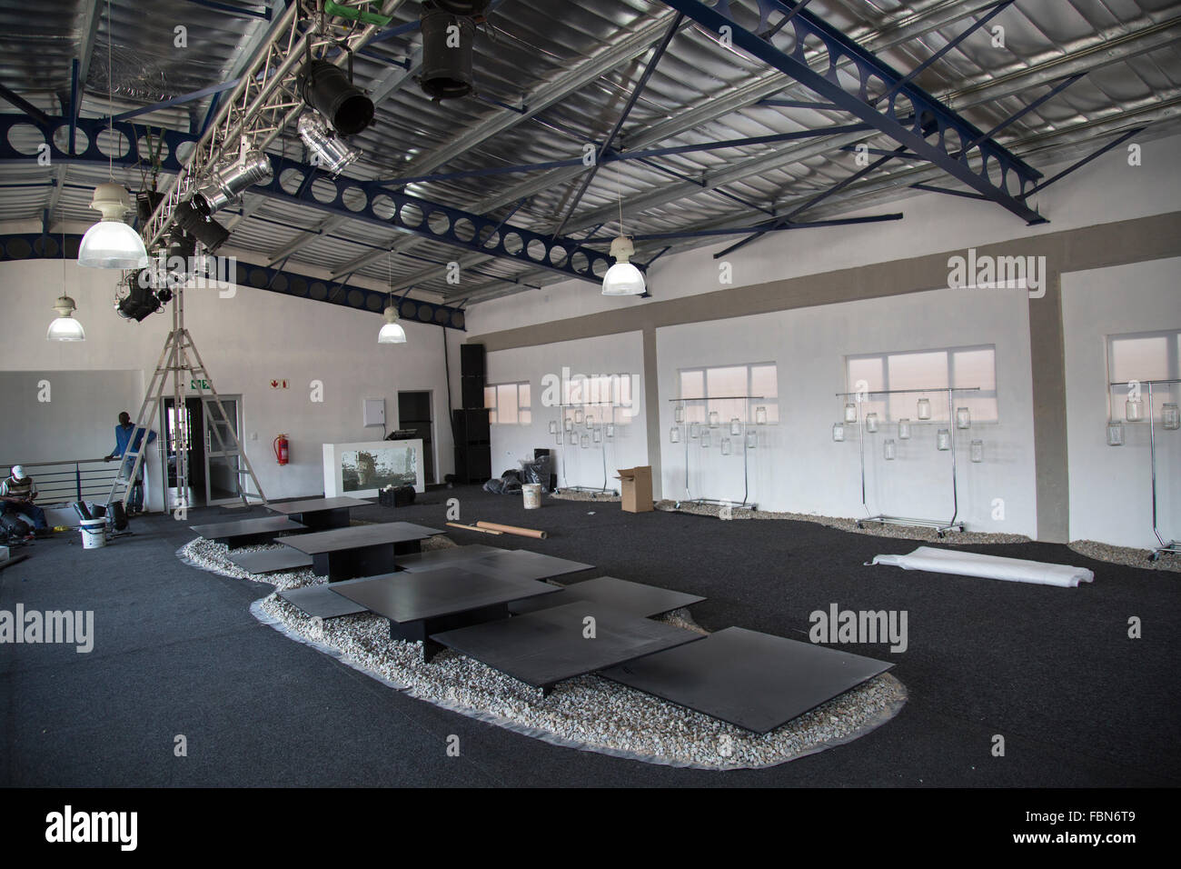 Interior view of a hall being prepared as a showroom display area for ...