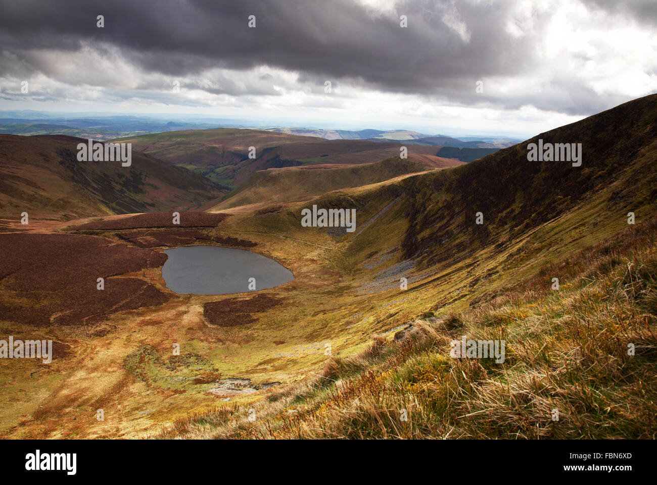 Photograph by © Jamie Callister. Llyn Lluncaws in the Berwyn Mountains ...