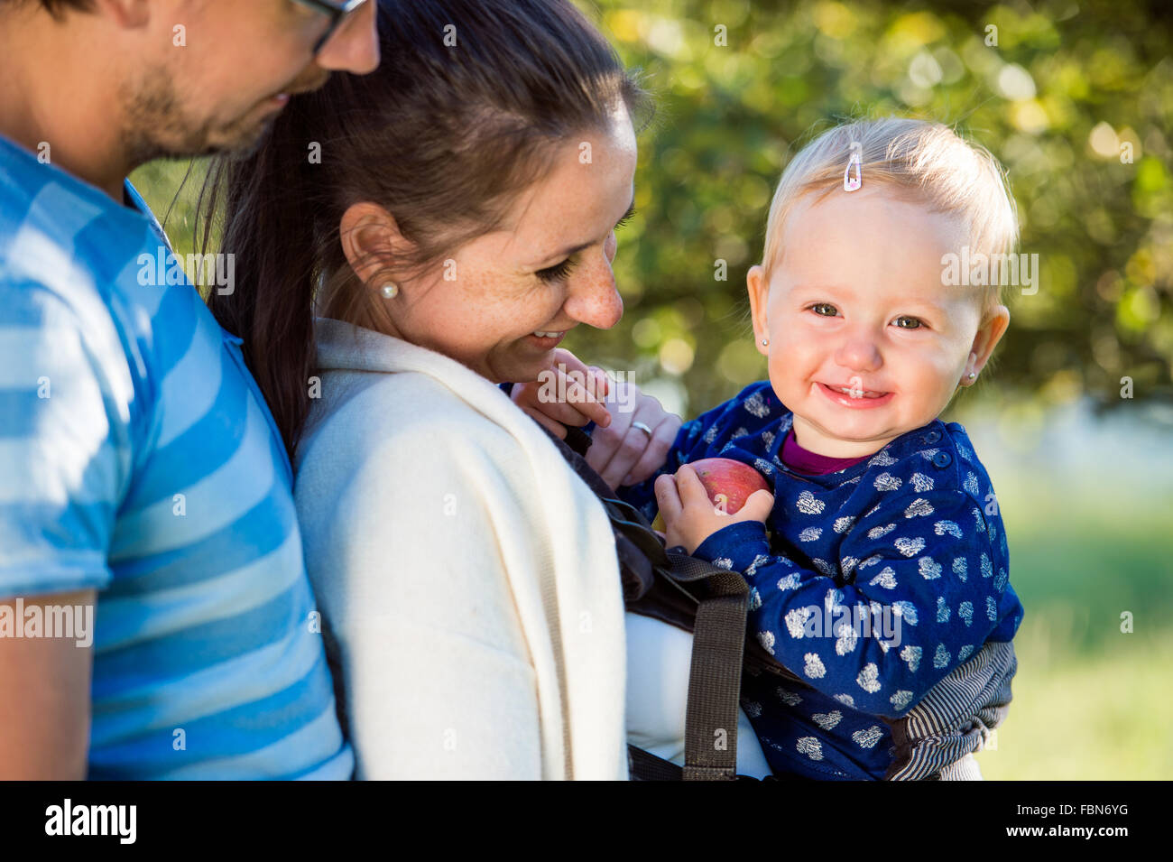 Happy family in nature Stock Photo - Alamy