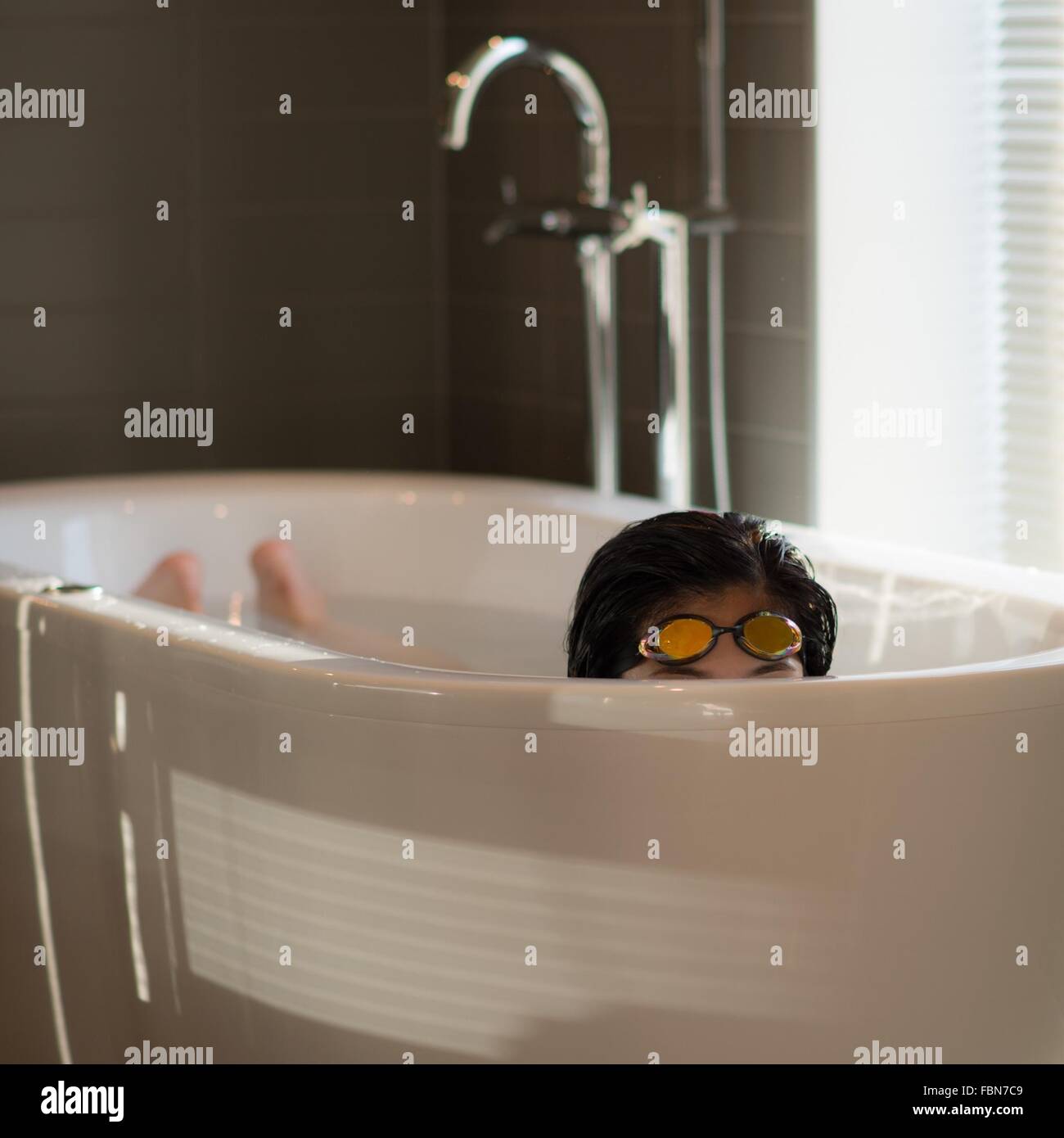 Woman in bathtub goggles hi-res stock photography and images - Alamy