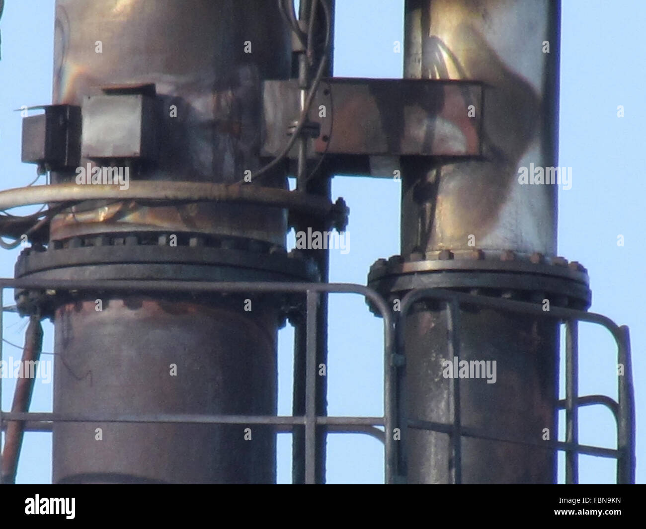 Flange connections on gas flaring. Burning through a torch head Stock ...