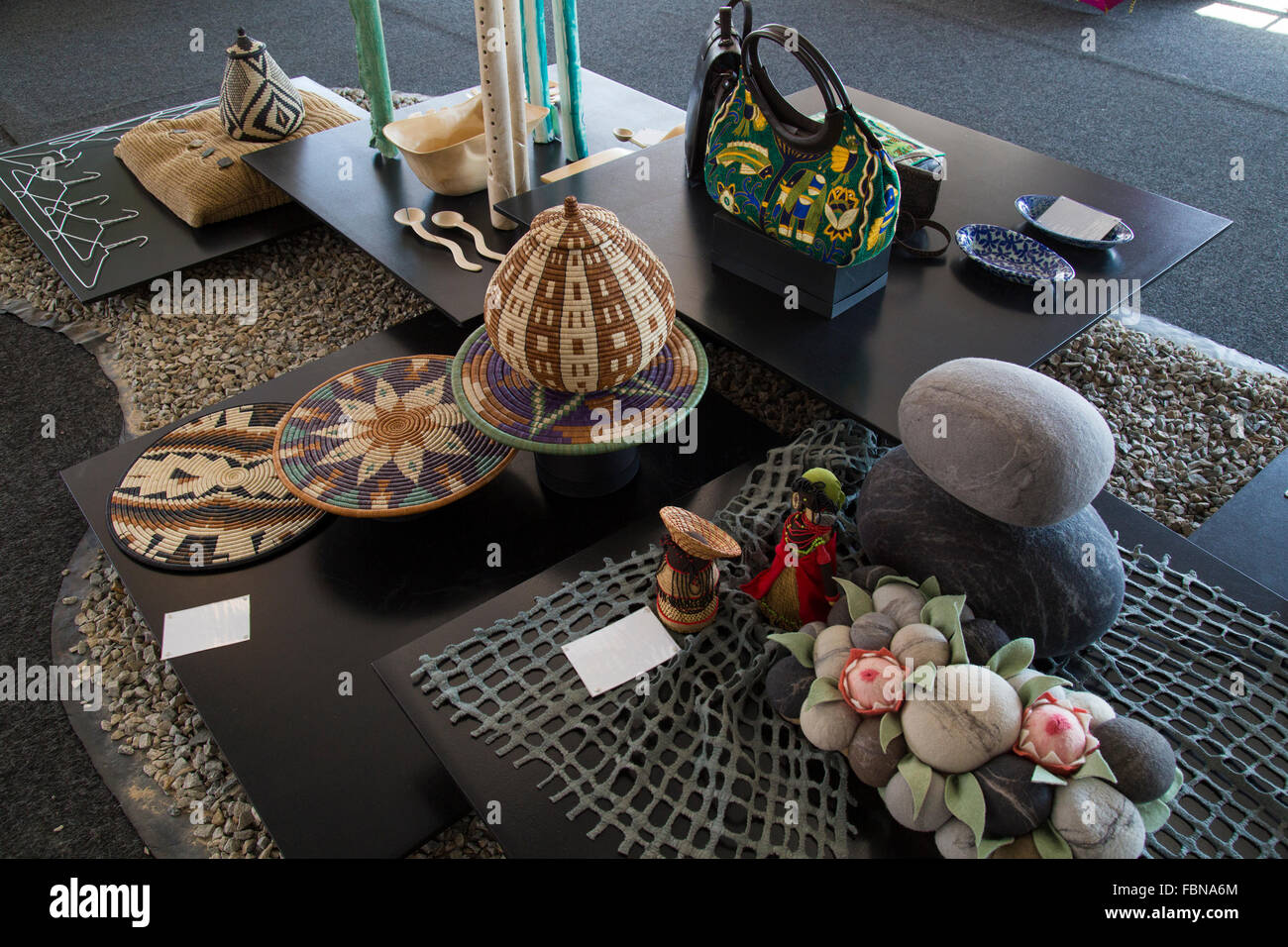 Display stands with hand-crafted curios, artworks and fashion items on ...