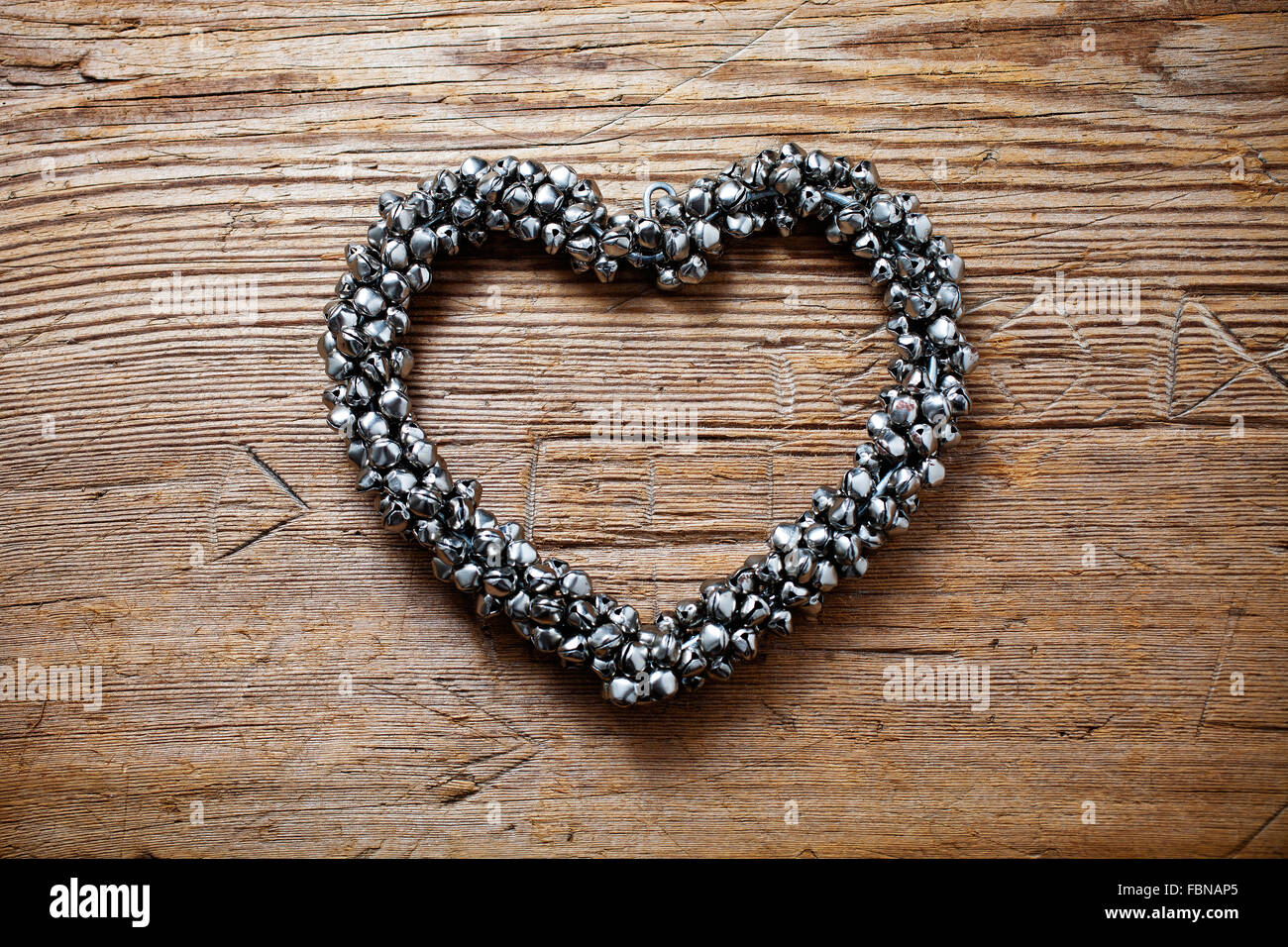 Heart shape made of jingle bells Stock Photo - Alamy