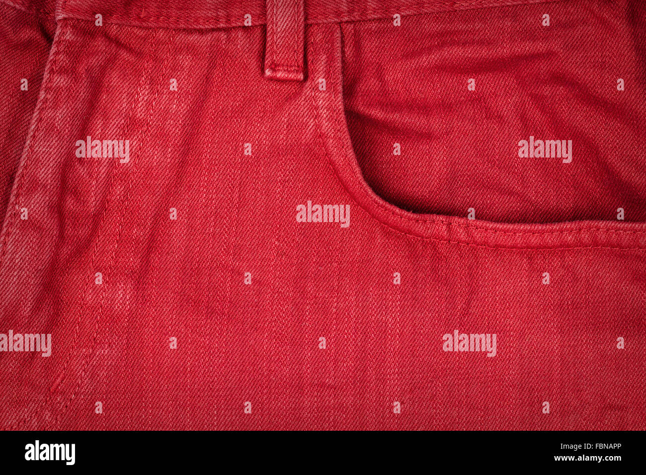Red jeans fabric with pocket background Stock Photo - Alamy