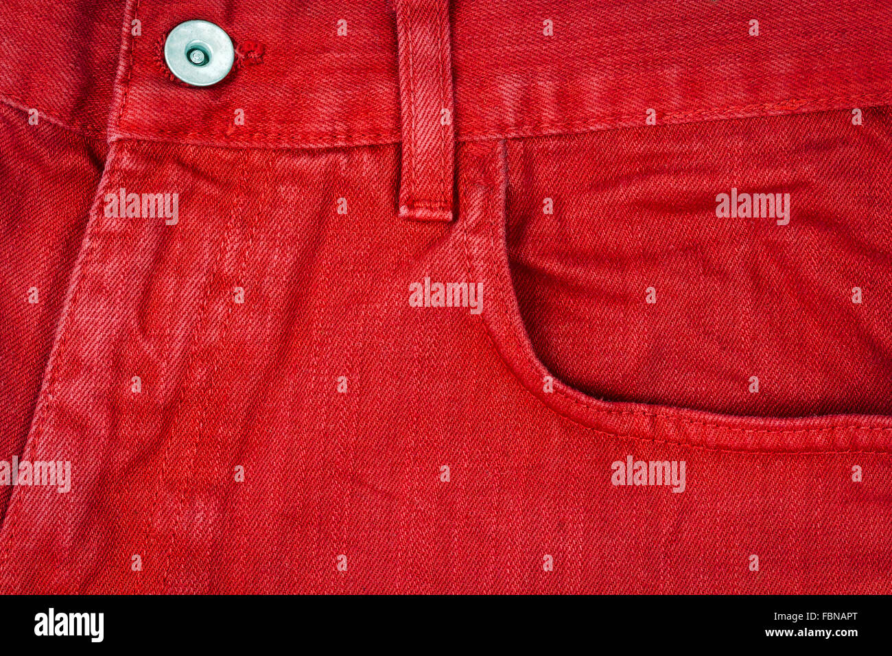 Red jeans fabric with pocket background Stock Photo - Alamy