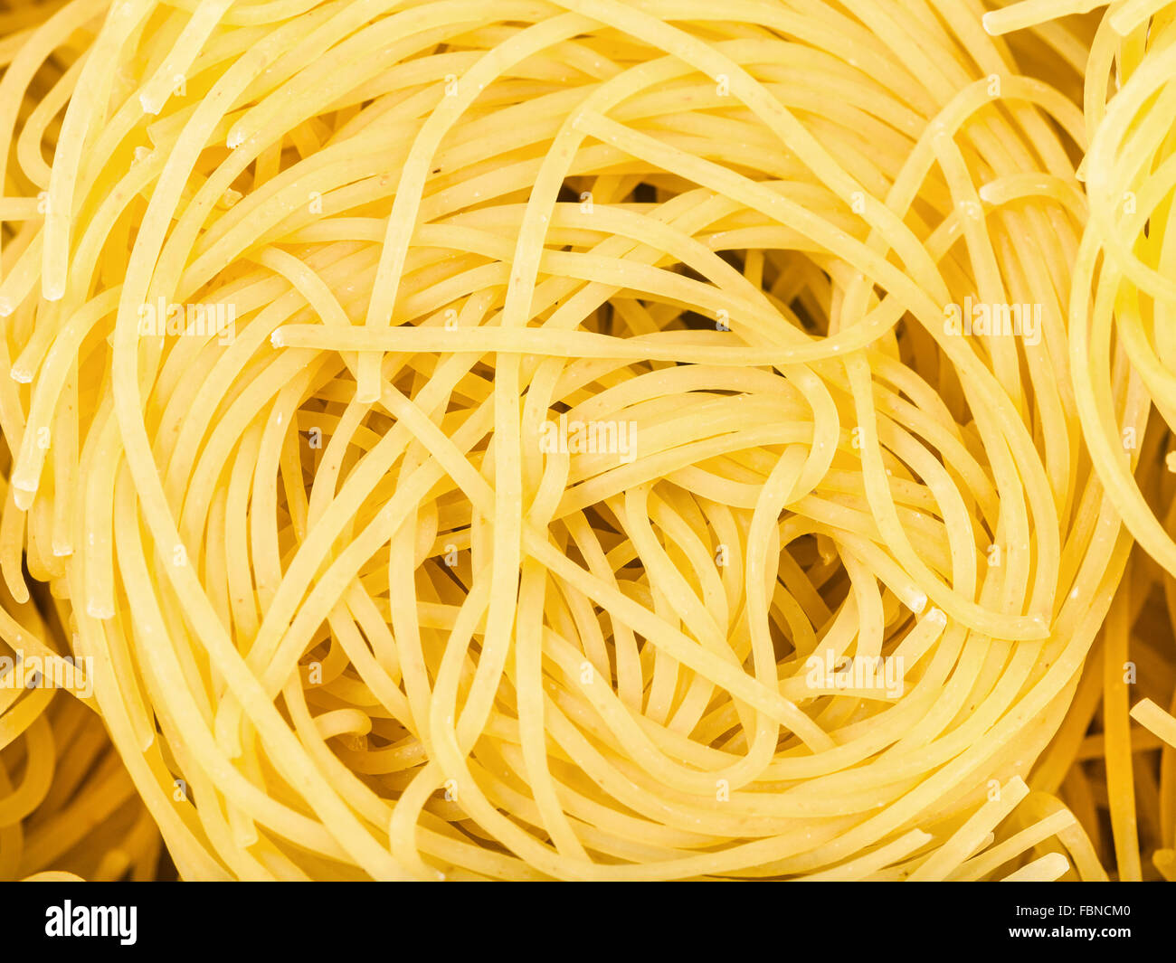 food background - durum wheat semolina pasta fidelini close up Stock ...
