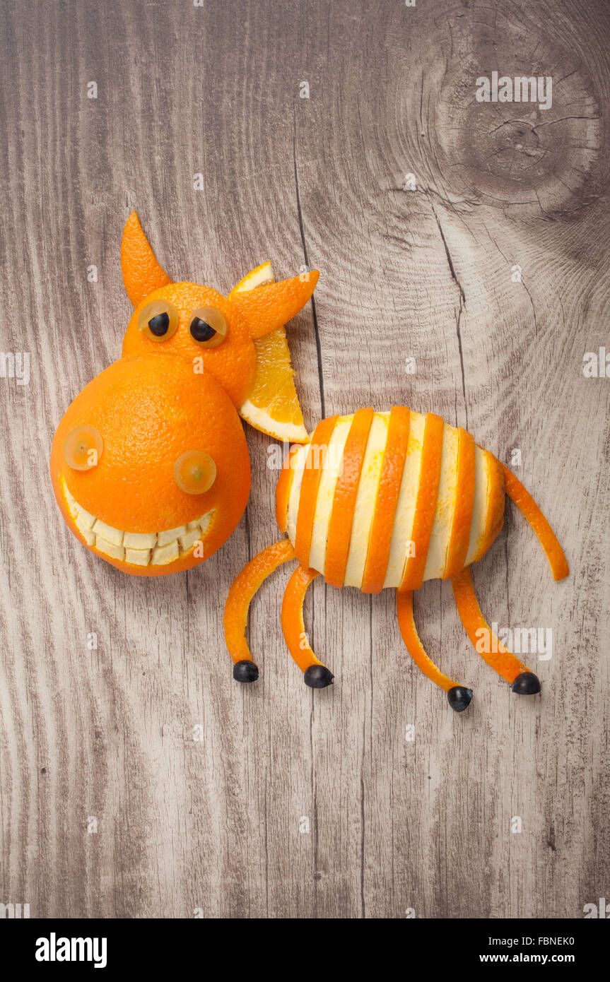 Zebra made of fruit on wooden background Stock Photo - Alamy