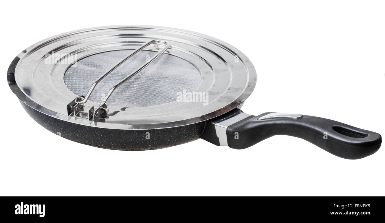 black frying pan closed by steel splatter screen isolated on white ...