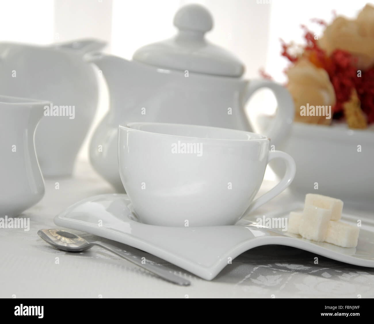 Midday cup of tea with sugar cubes Stock Photo - Alamy