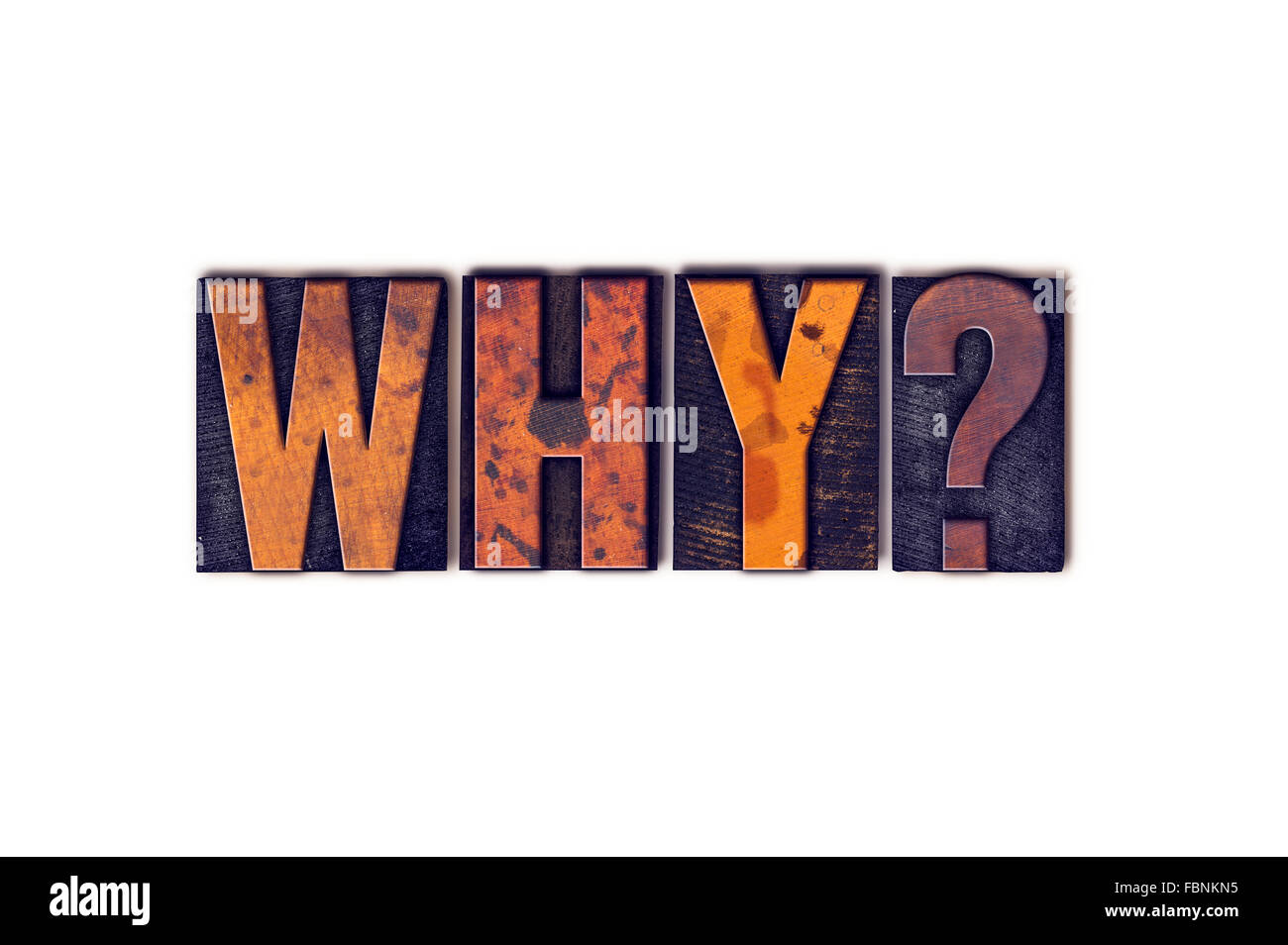 The word "Why" written in isolated vintage wooden letterpress type on a ...