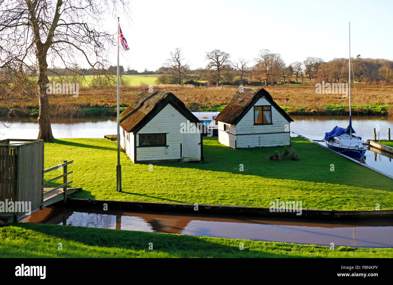 A pair of thatched premises and moorings by the River Bure on the ...