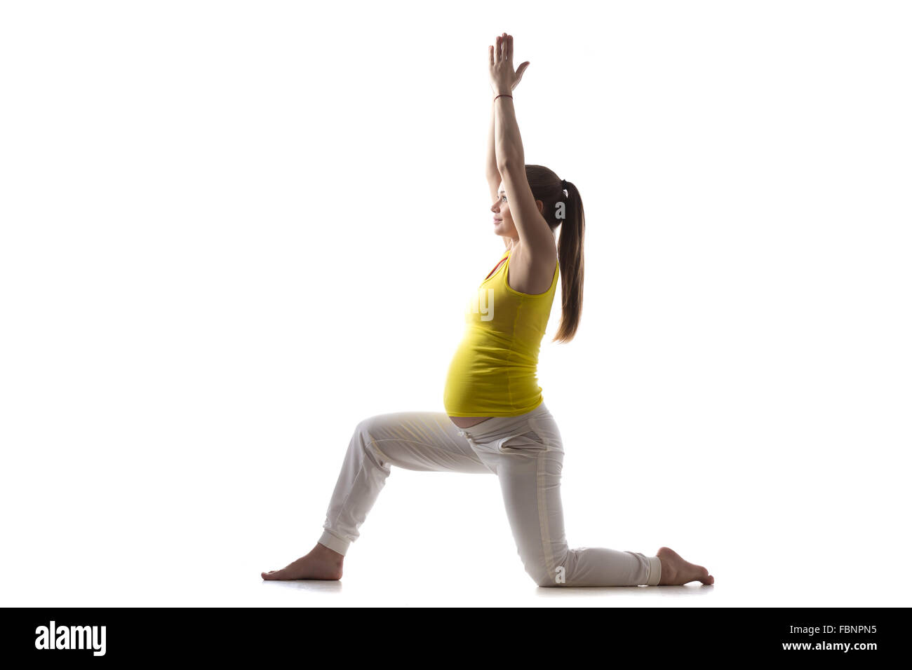 Full length silhouette of young pregnant fitness model in sportswear ...