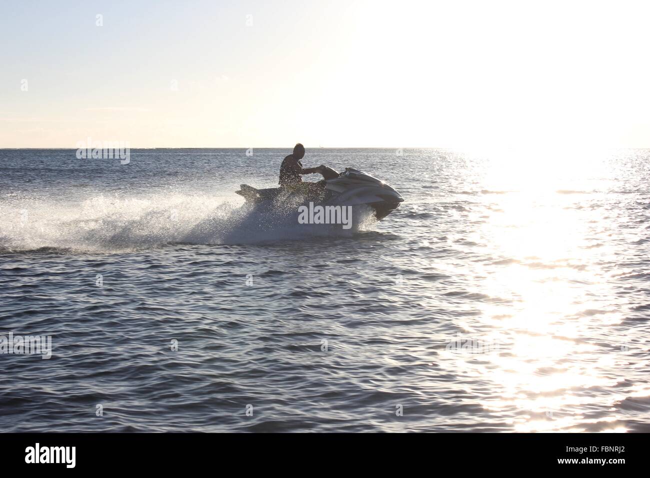 Man Riding Jet Ski Stock Photos & Man Riding Jet Ski Stock Images - Alamy