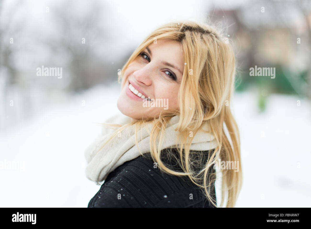woman enjoying outdoors while snowing Stock Photo - Alamy