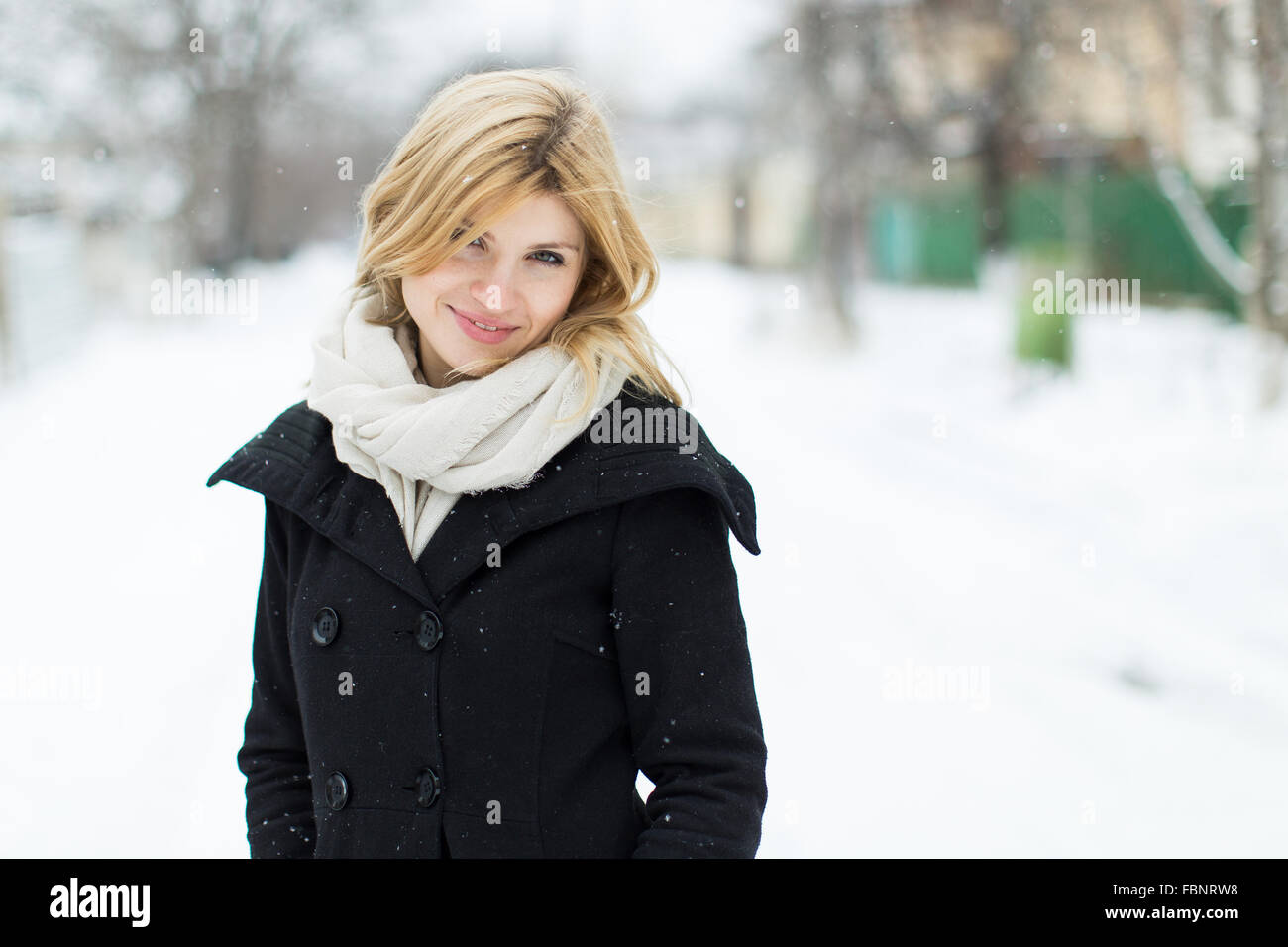 woman enjoying outdoors while snowing Stock Photo - Alamy