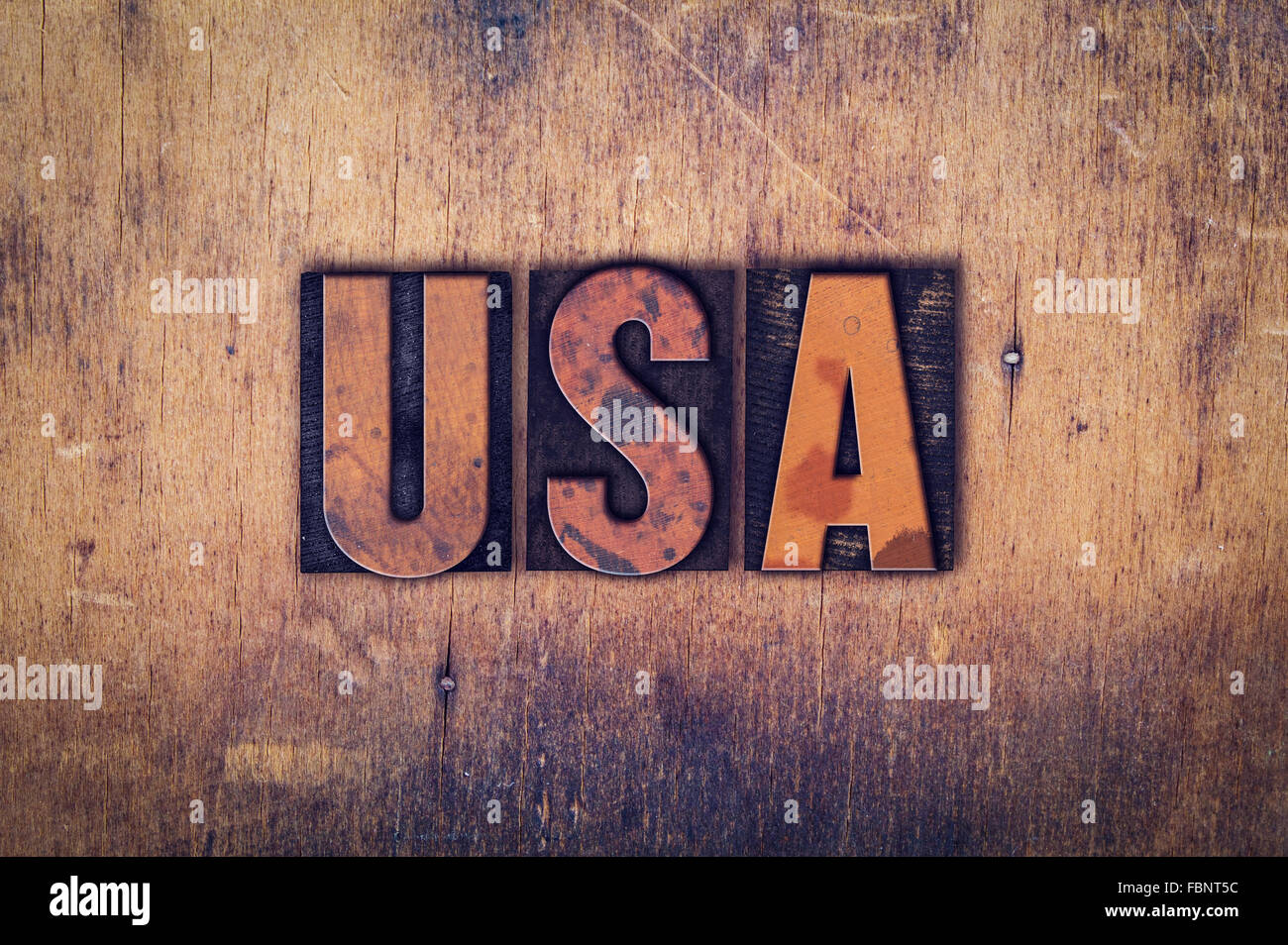 The word "USA" written in dirty vintage letterpress type on a aged ...