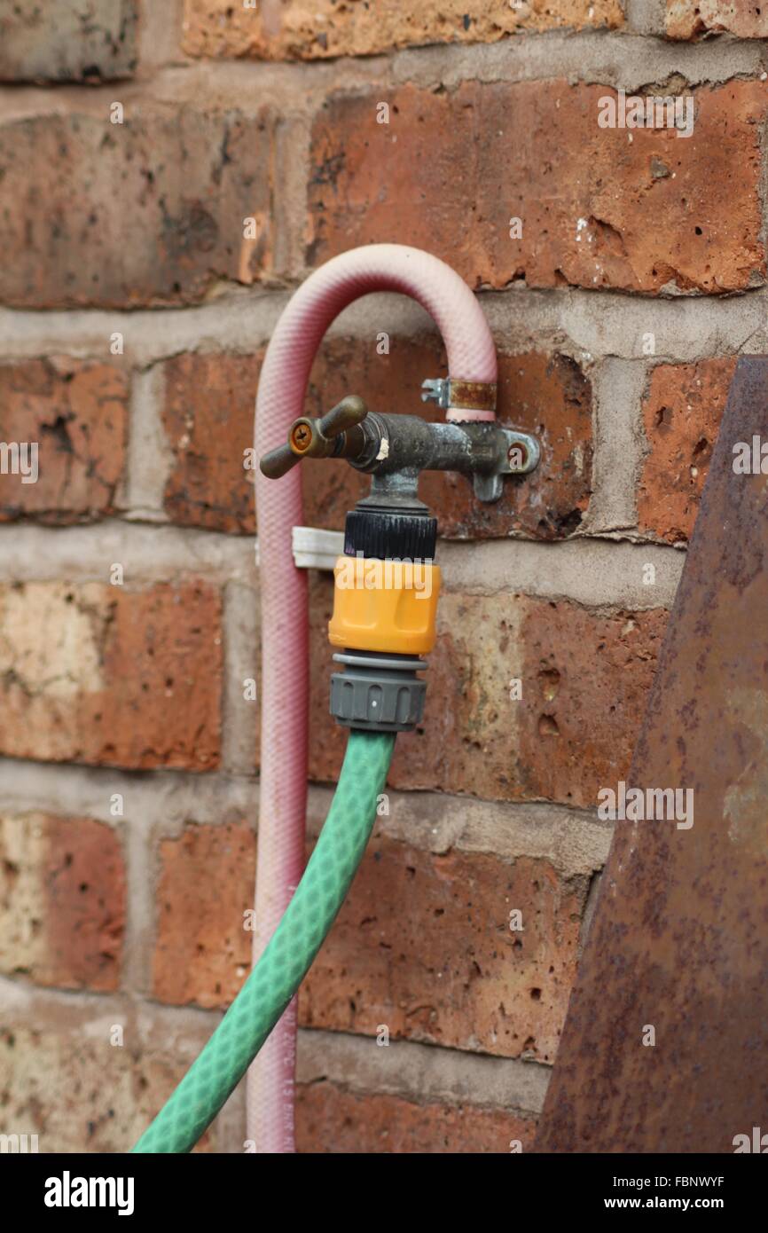 Garden tap hi-res stock photography and images - Alamy