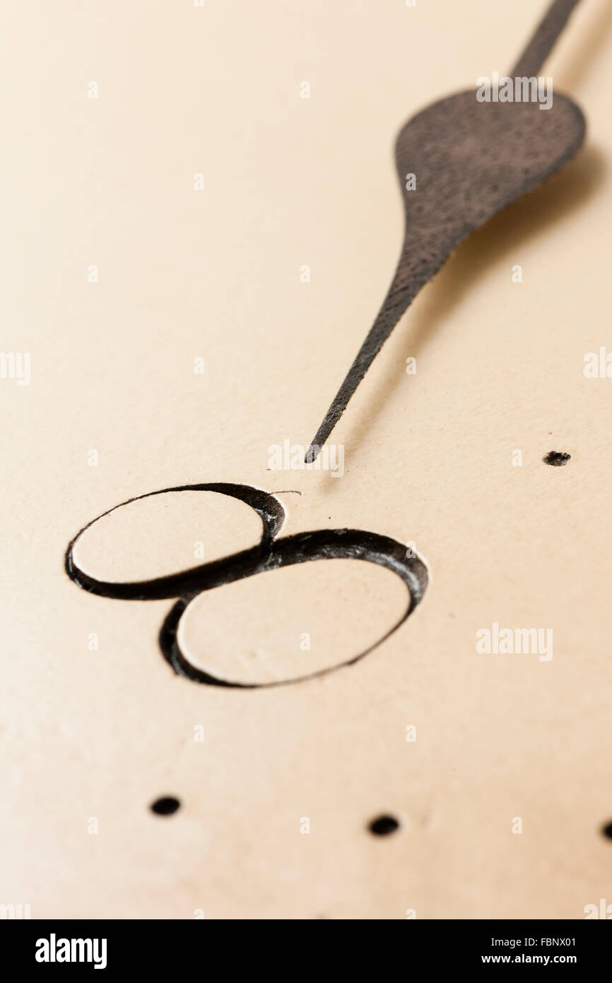 clock hand pointing to 8 o'clock Stock Photo - Alamy