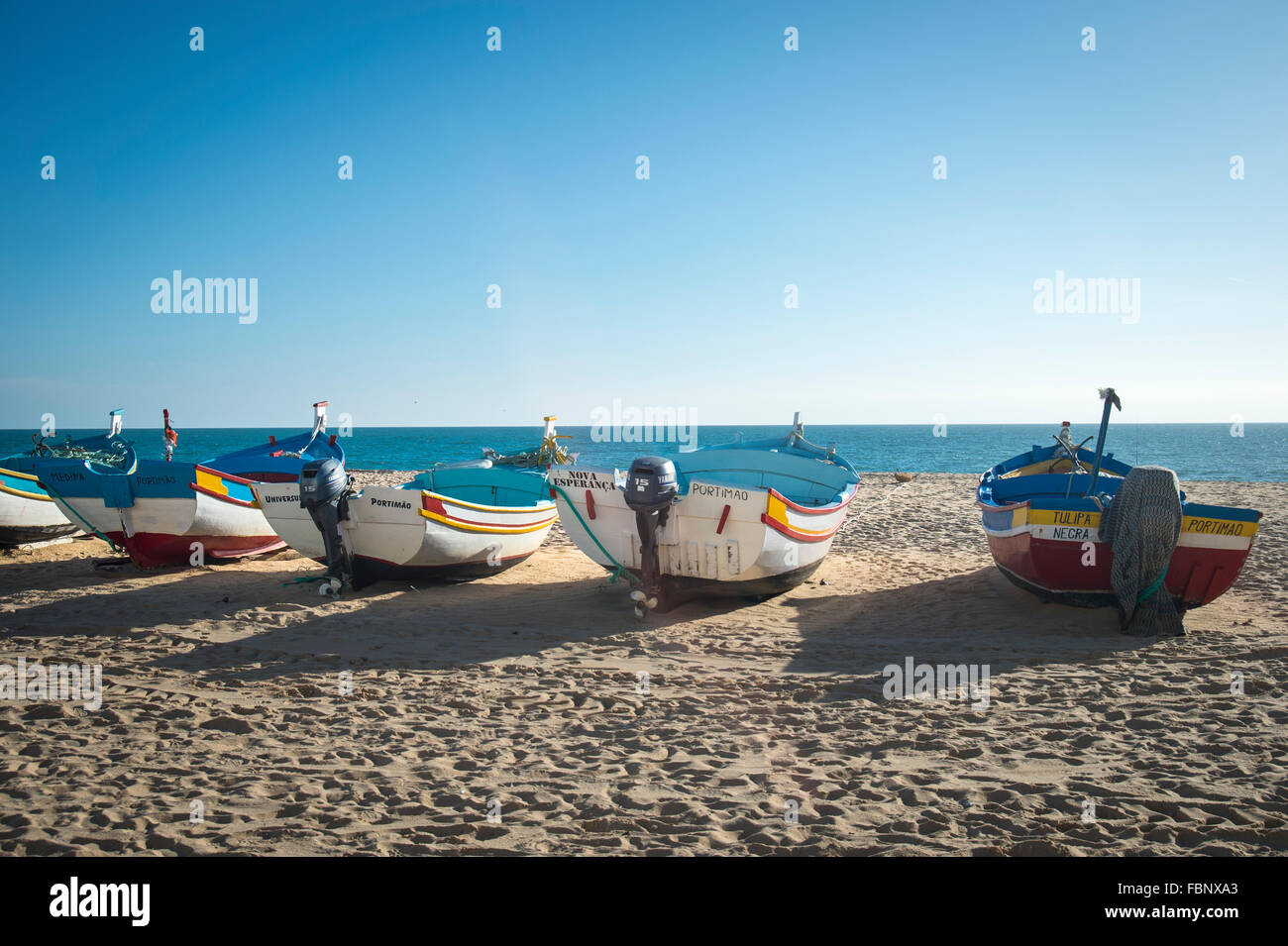 Traditional portuguese fishing boats on the beach at Armaco in the ...