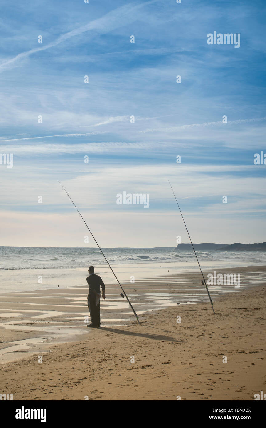 Fisherman standing on beach hi-res stock photography and images - Alamy