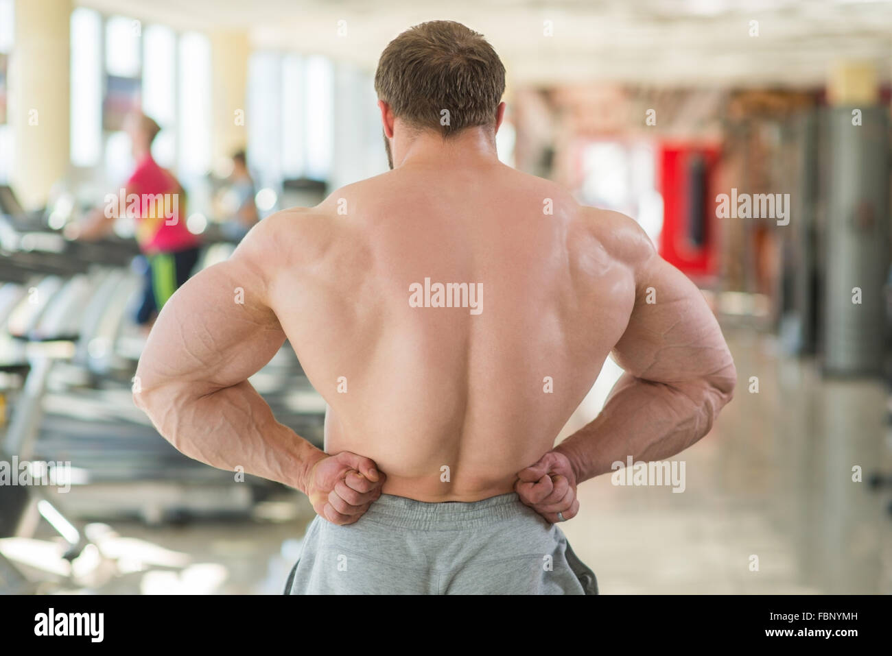 Muscular man's back Stock Photo - Alamy
