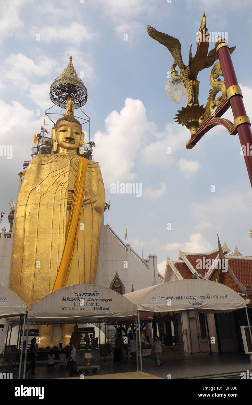 32 m. high standing Buddha with mythical bird lamp standard, temple ...