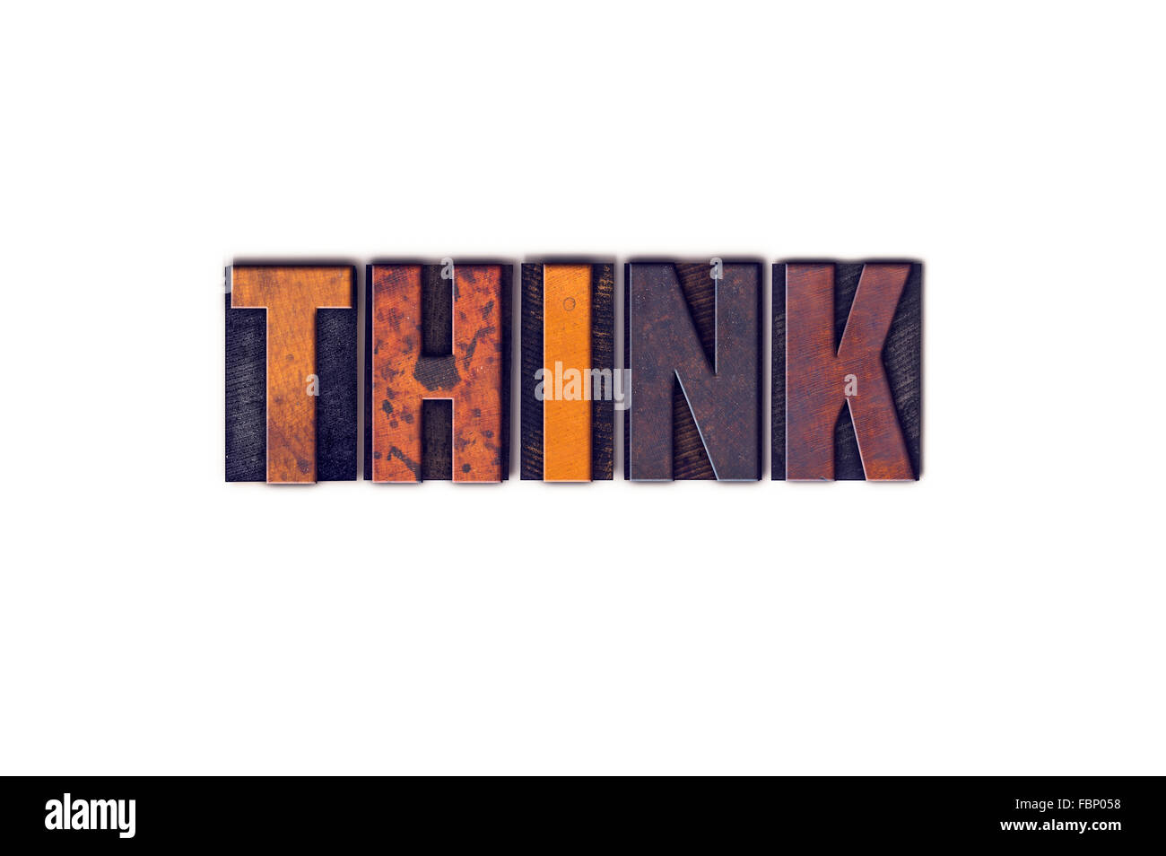 The word "Think" written in isolated vintage wooden letterpress type on ...