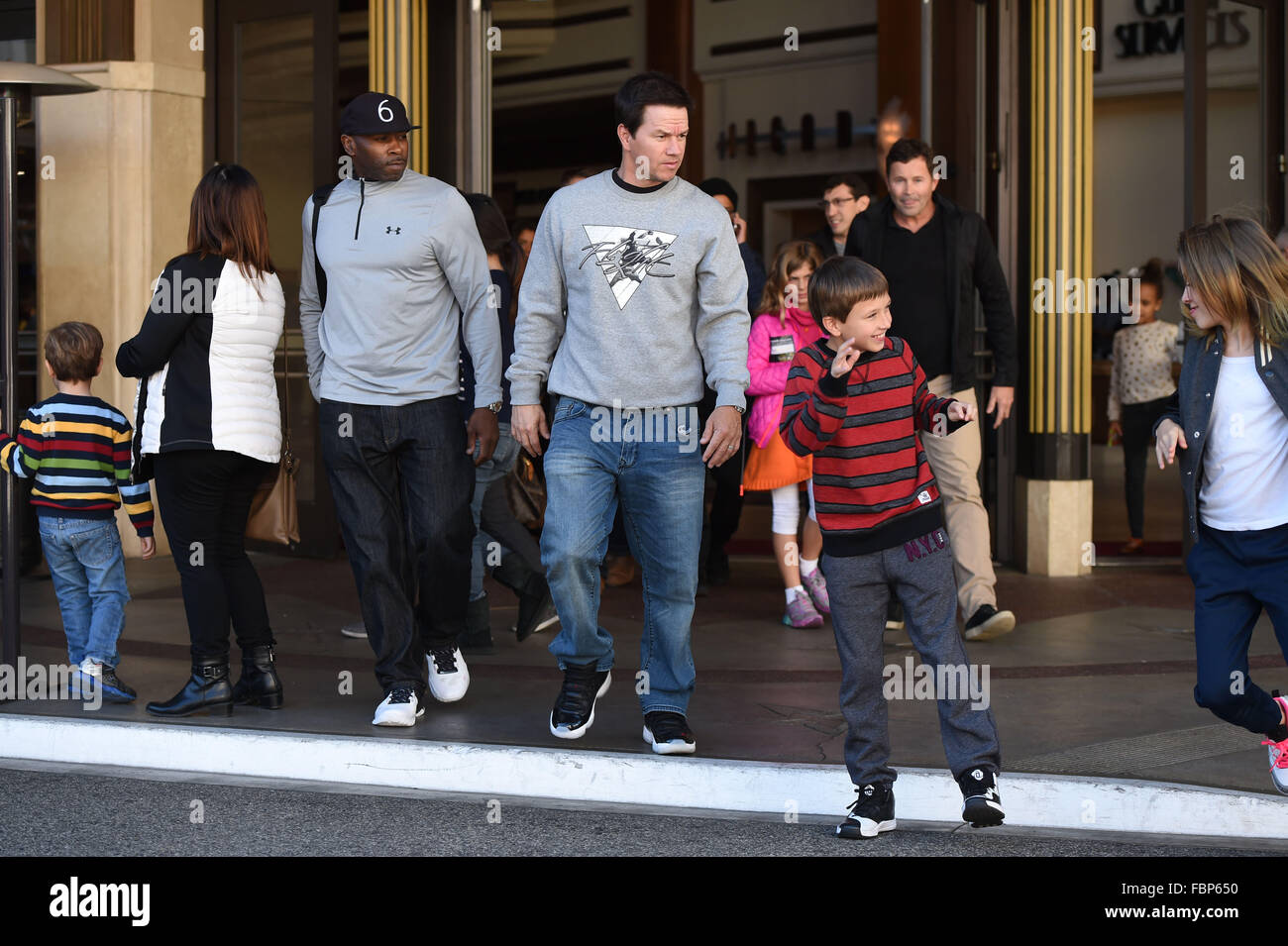 Mark wahlberg takes his two eldest kids hi-res stock photography and ...