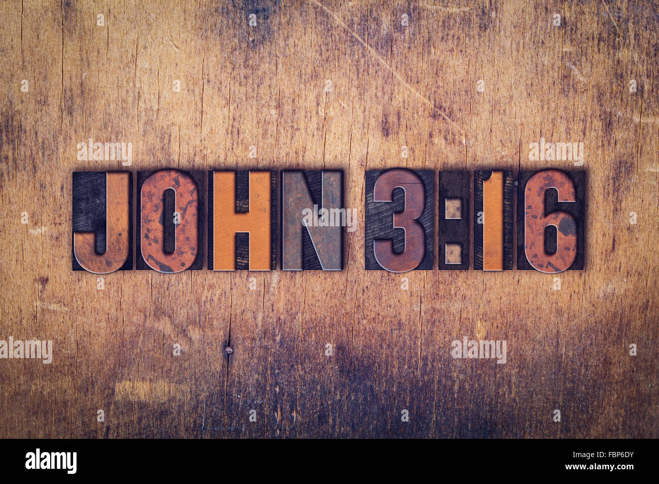 The verse "John 316" written in dirty vintage letterpress type on a ...